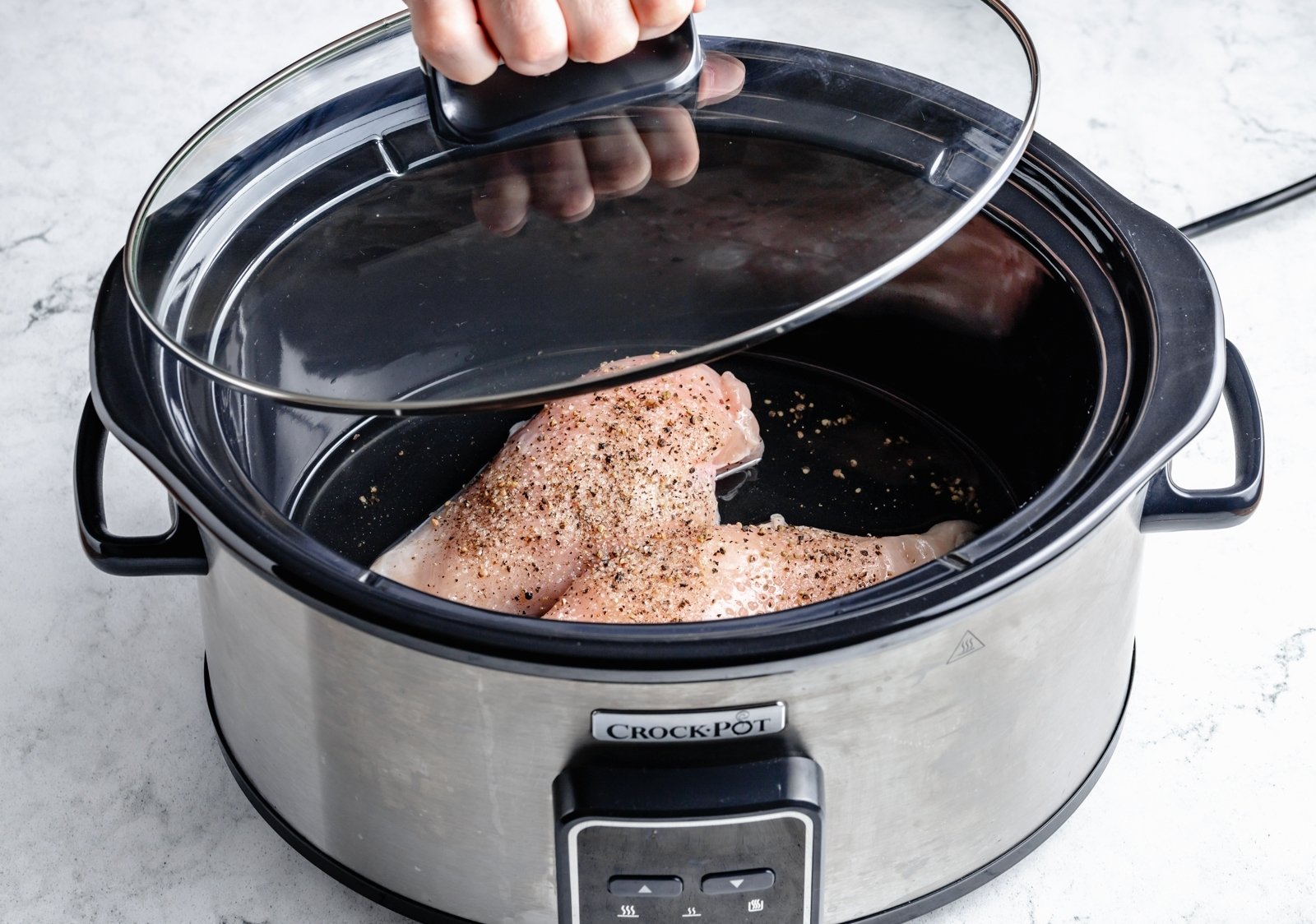 How much water do you put in crock pot for chicken?