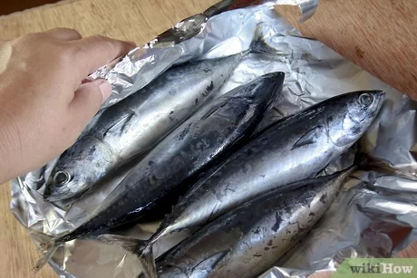 How should fish and seafood be stored?