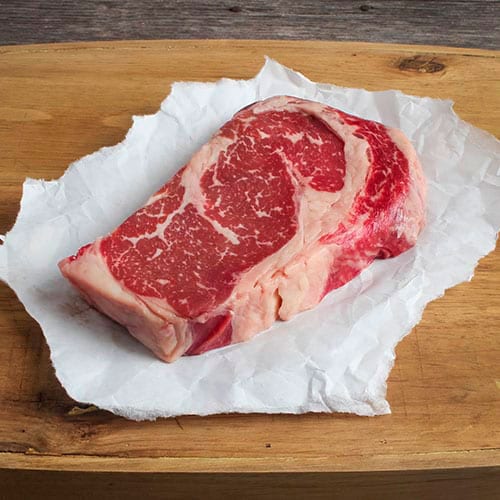 How thick is a 14 oz ribeye?