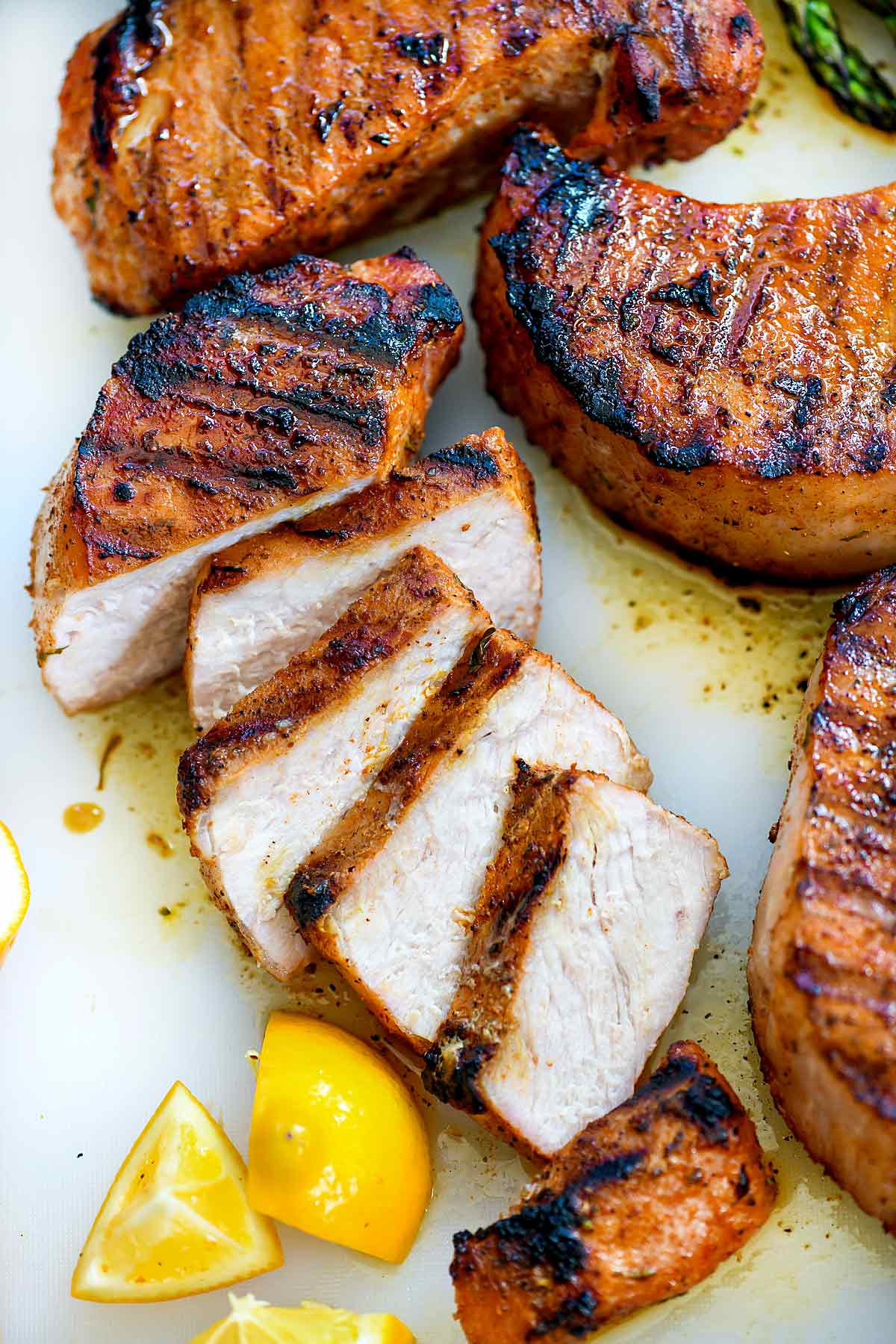 How thick should a grilled pork chop be?