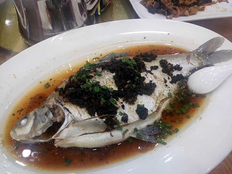 In what country is it unlucky to flip a fish on your plate?
