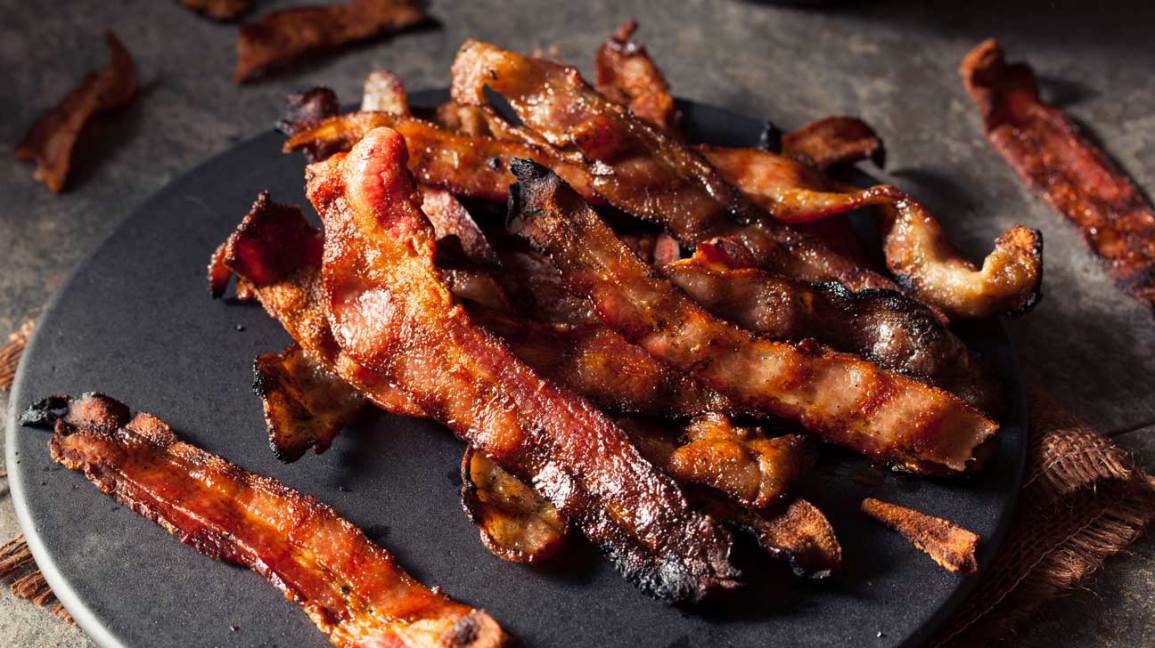 Is bacon healthier if you cook it longer?