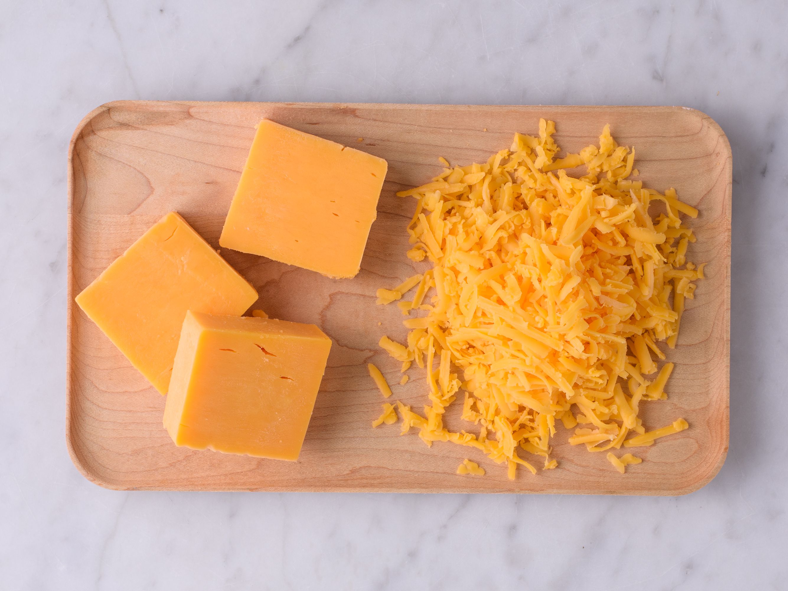 Is cheddar cheese low in calcium?