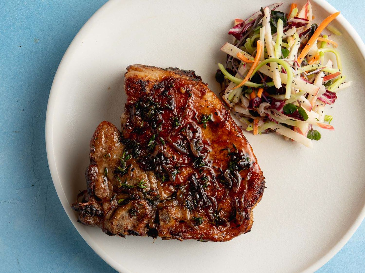 Is it better to bake or sear pork chops?
