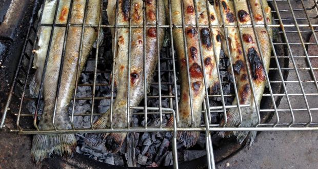 Is it better to grill fish inside or outside?