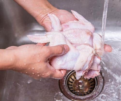 Is it necessary to wash meat before cooking?