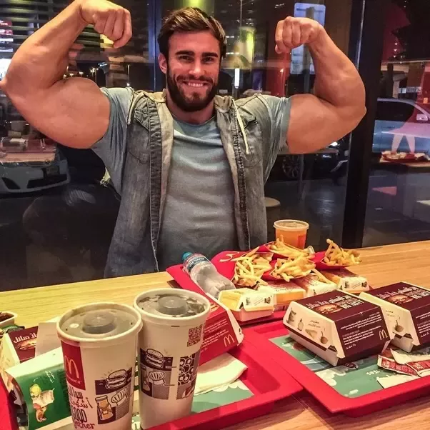 Is it okay to eat junk food while building muscle?