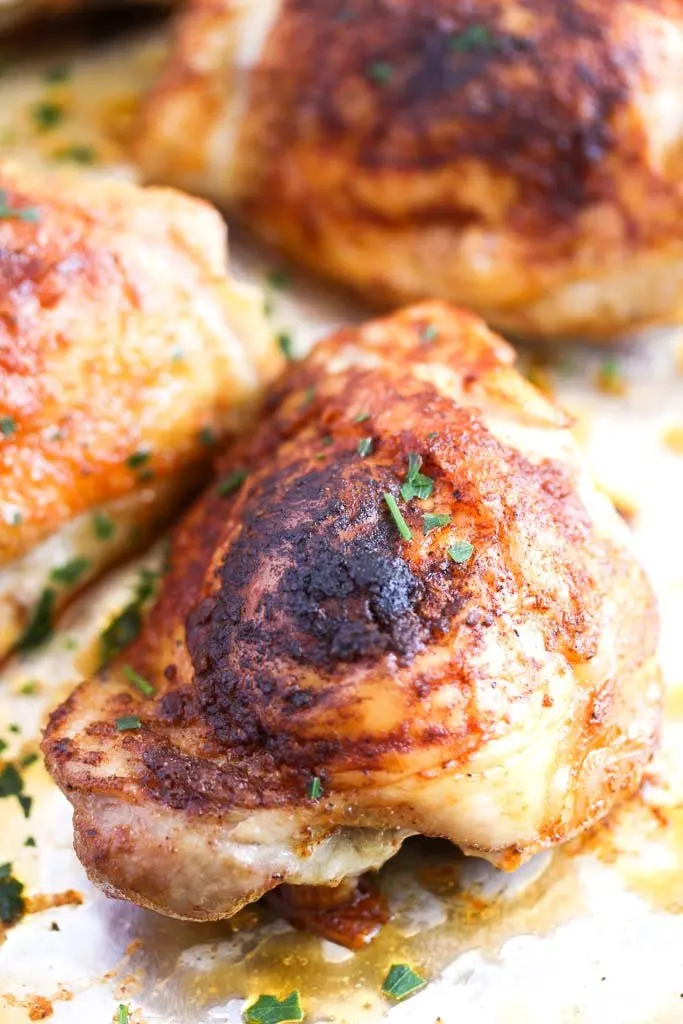 Is it safe to cook frozen chicken thighs in the oven?