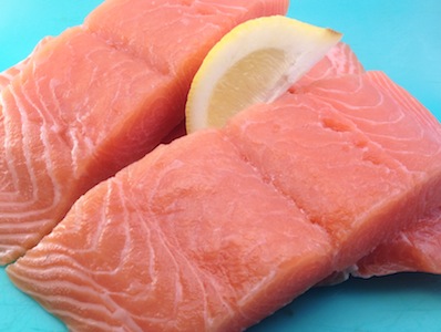 Is it safe to eat salmon past the sell by date?