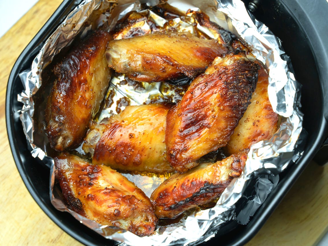 Is it safe to put aluminum foil in an air fryer?