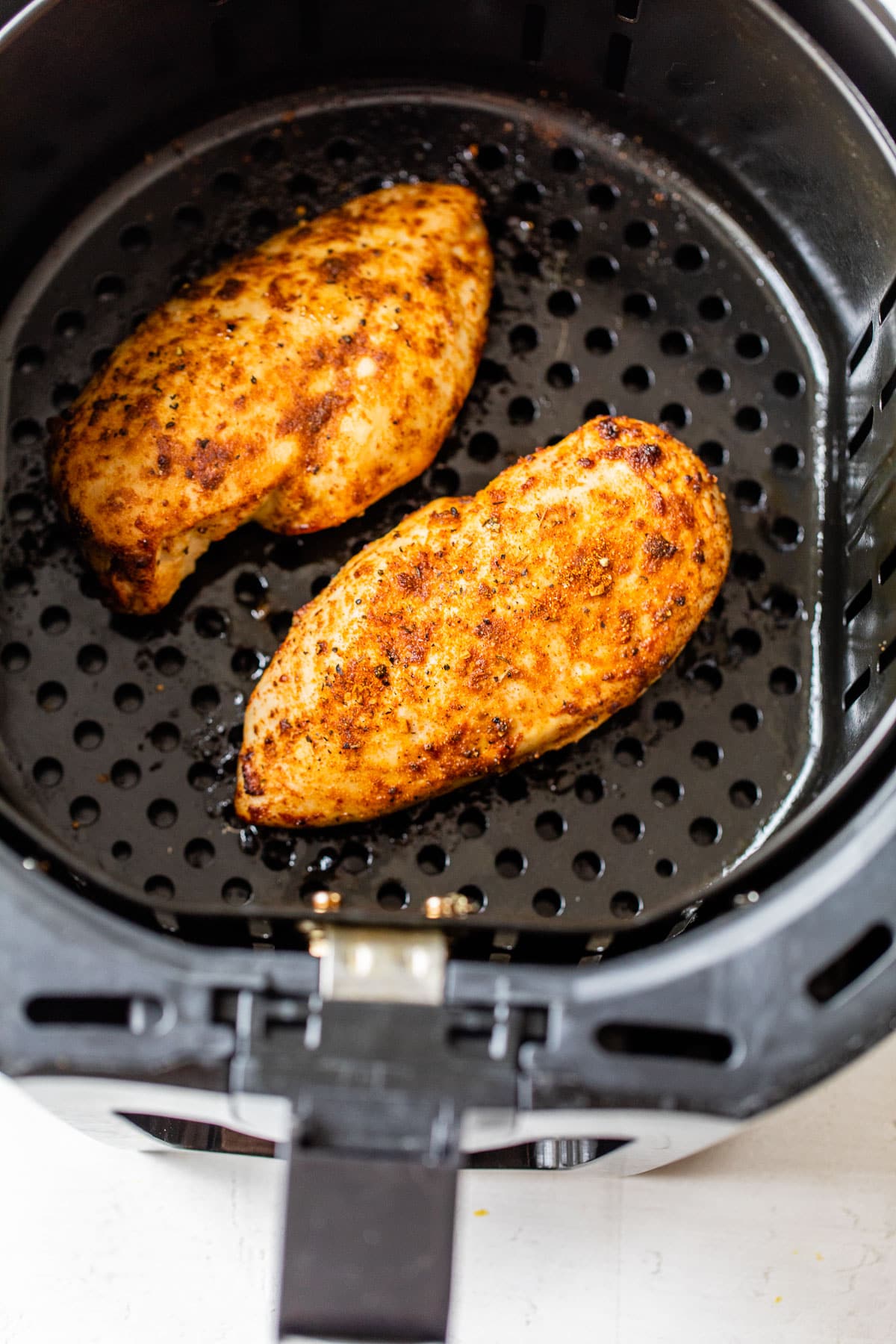 Is it safe to put raw chicken in Airfryer?