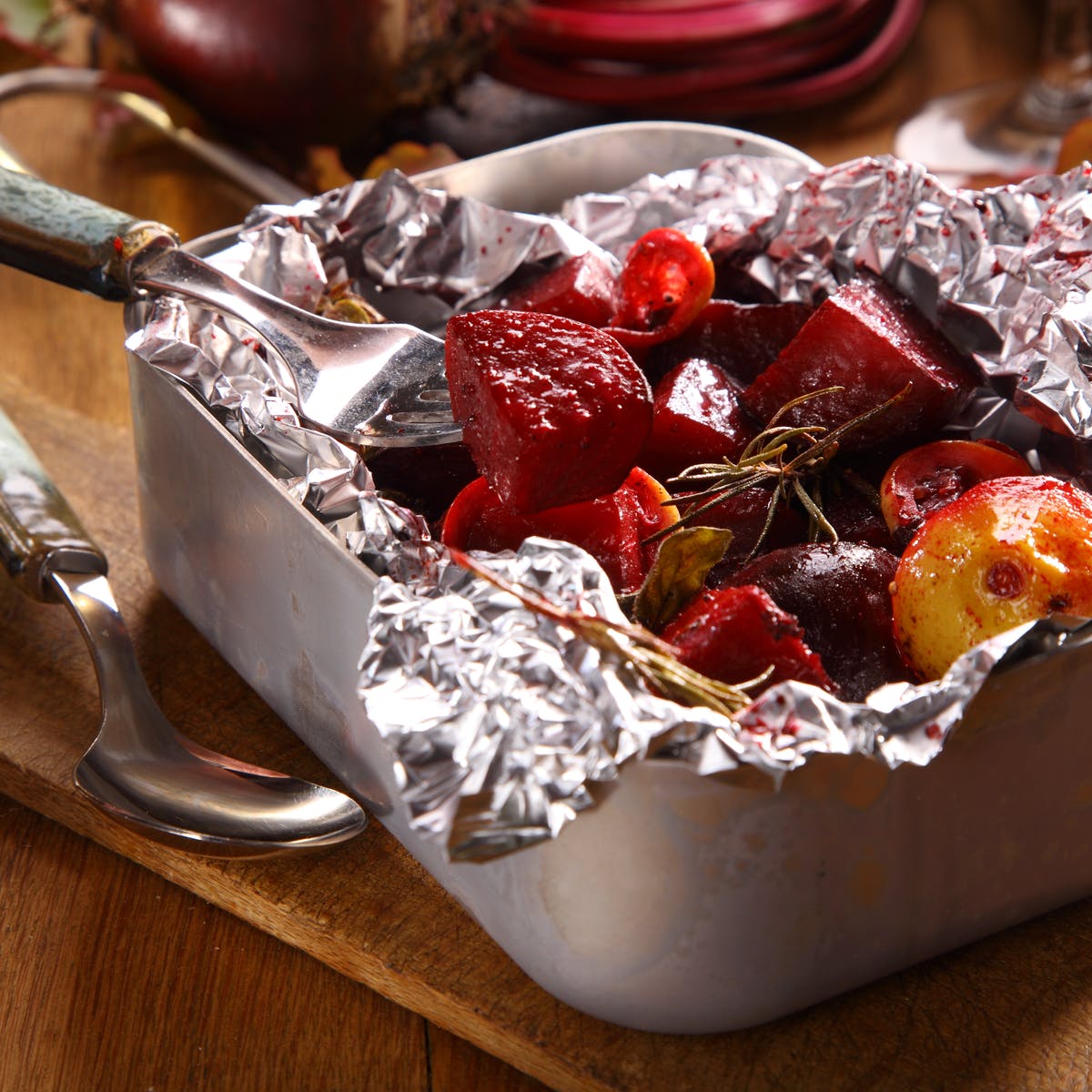 Is it safe to wrap food in foil when baking?