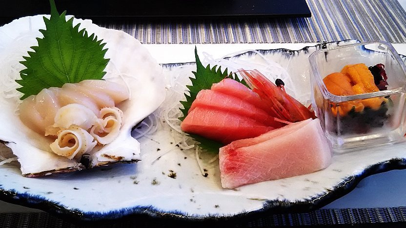 Is sashimi raw or cured?