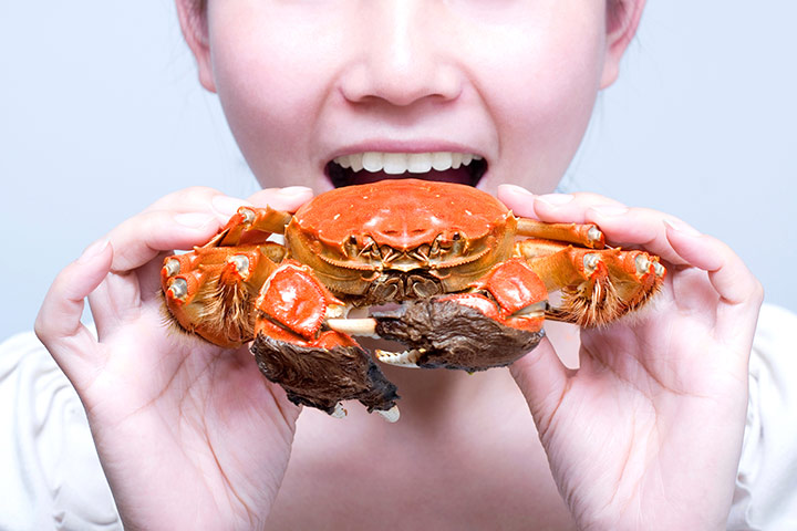Is undercooked crab safe to eat?