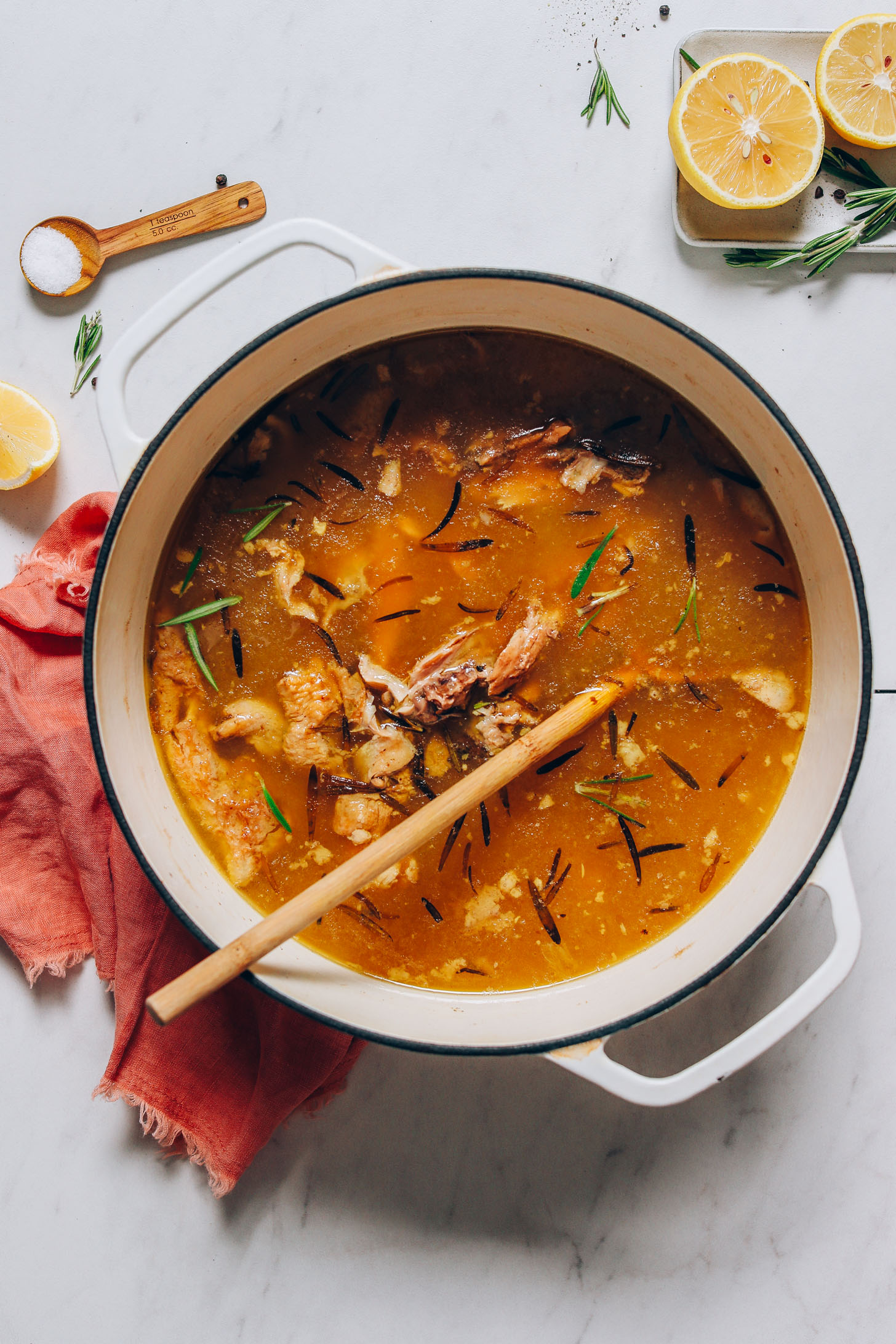 Should bone broth be cooked covered or uncovered?