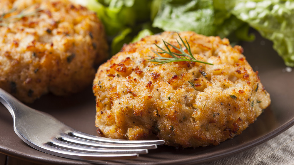 Should crab cakes be fried or broiled?