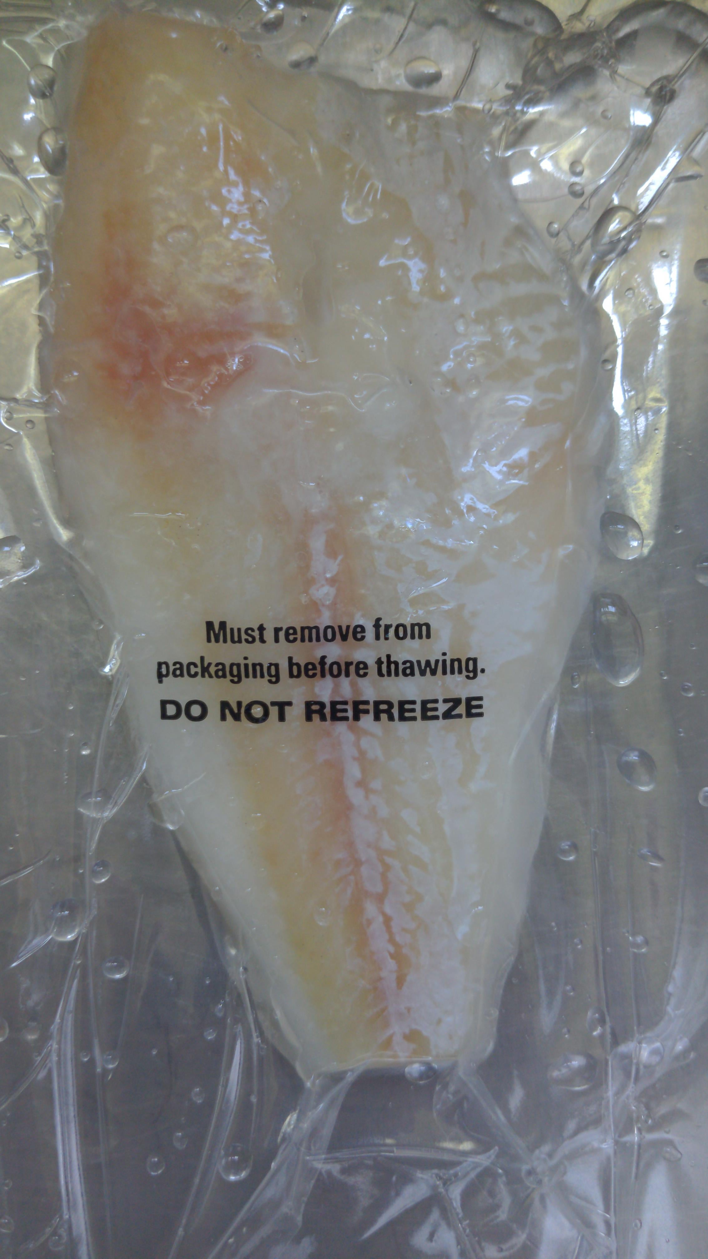 Should fish be remove from package before thawing?