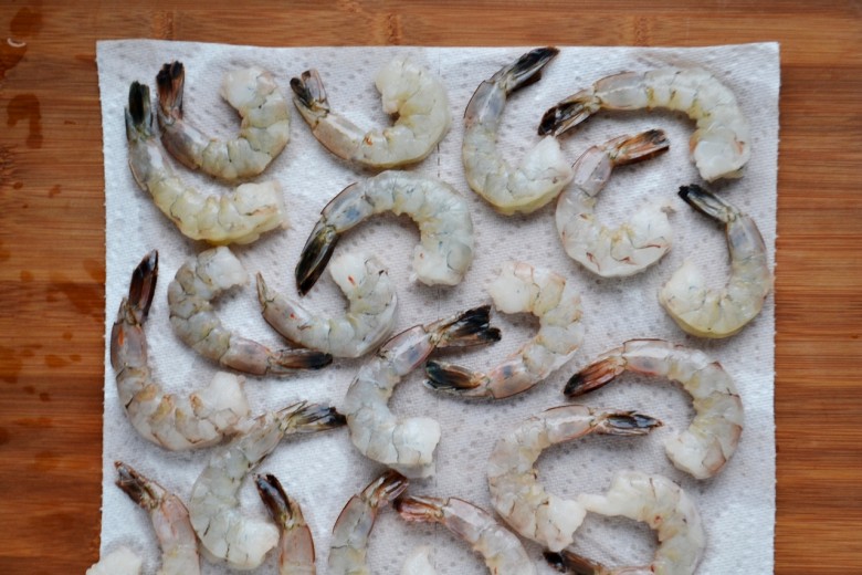 Should frozen shrimp be rinsed before cooking?