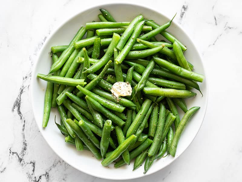 Should green beans be steamed or boiled?