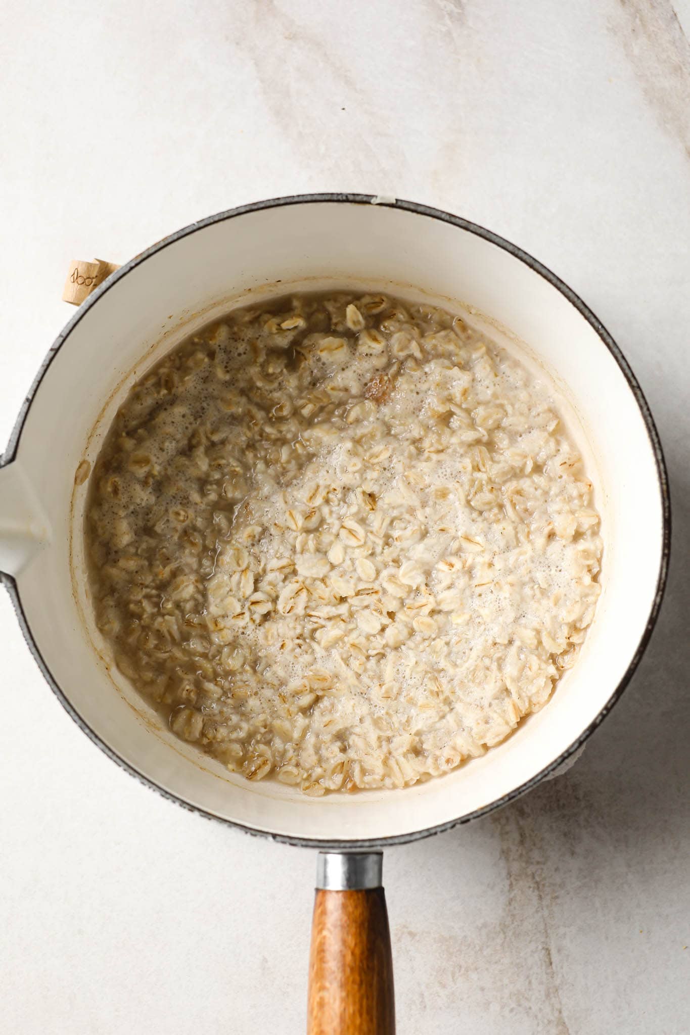 Should I cook my oats in milk or water?