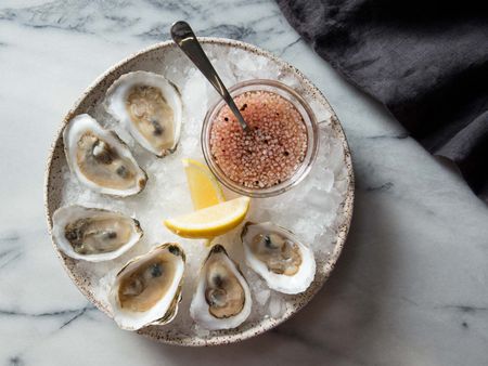 Should oysters be cooked cupped up or down when cooking?