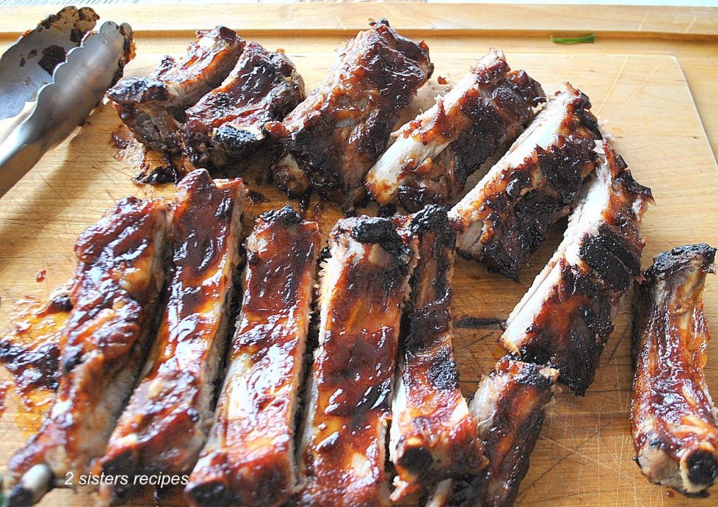 Should you bake ribs in water?