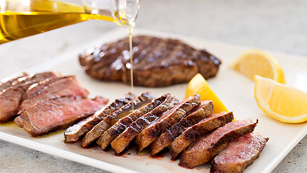 Should you put olive oil on steak before grilling?