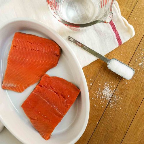 Should you soak salmon in salt water before cooking?