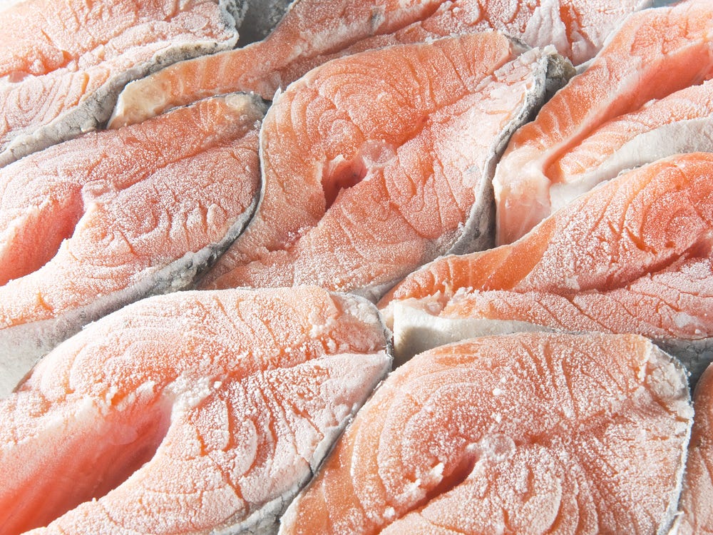 Should you wash frozen fish before cooking?