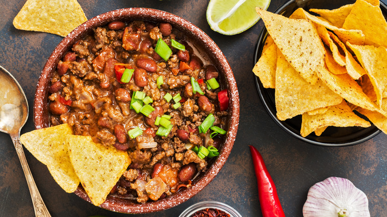 What adds more flavor to chili?