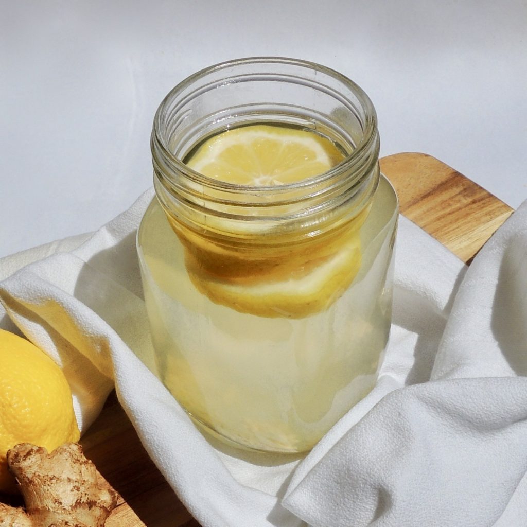What are the benefits of drinking lemon garlic and ginger water?