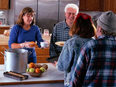 What are the benefits of volunteering at a soup kitchen?