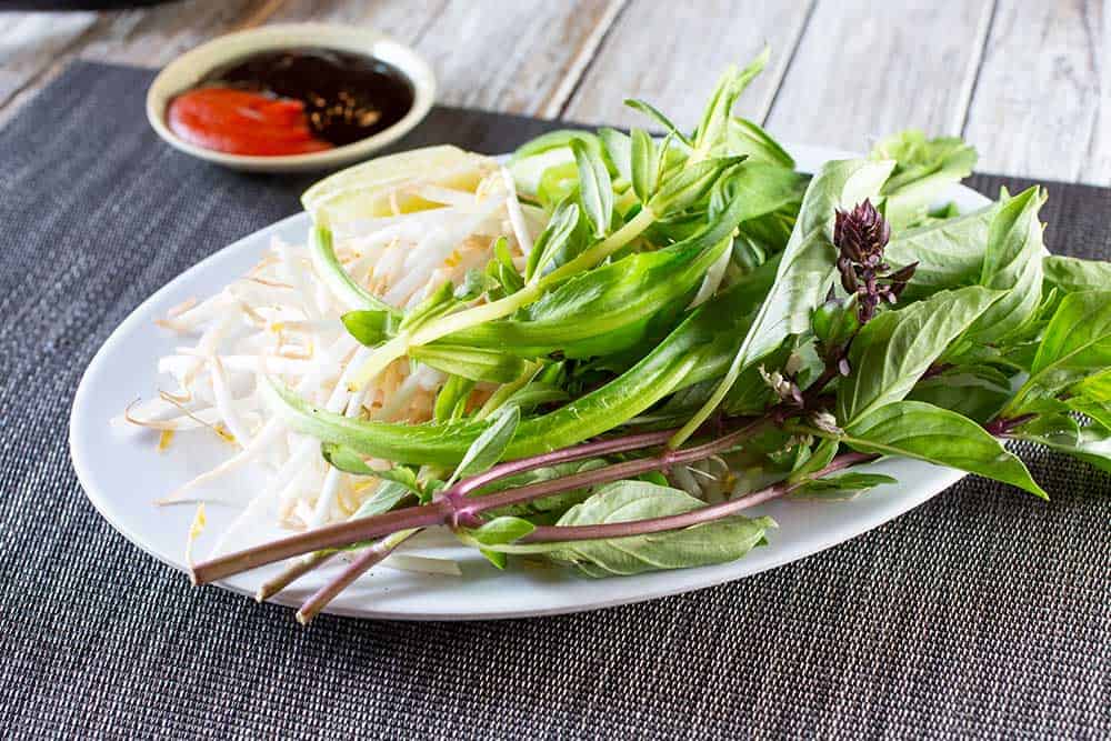 What are the greens served with pho?