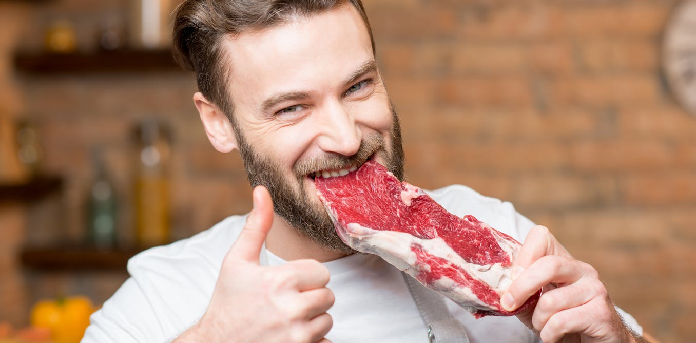 What are the risks of eating raw meat?