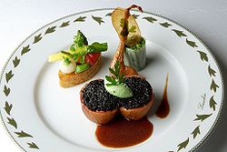 What are three qualities of haute cuisine?