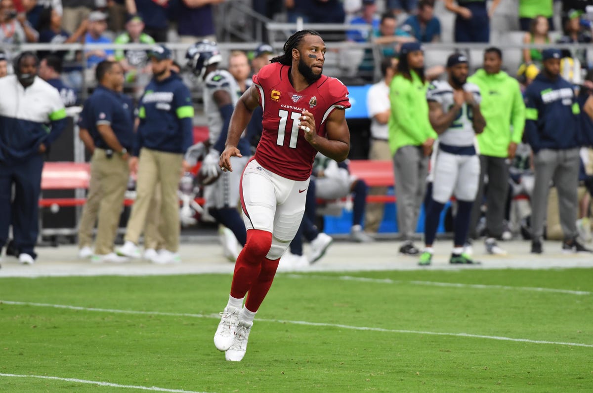 What businesses does Larry Fitzgerald own?