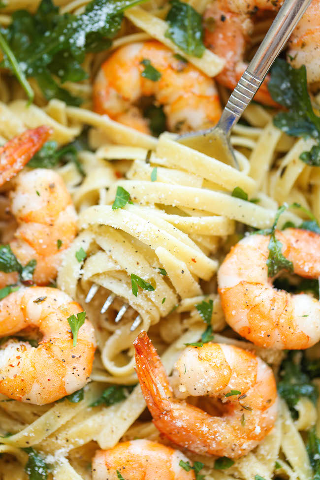 What do you cook shrimp with over pasta?