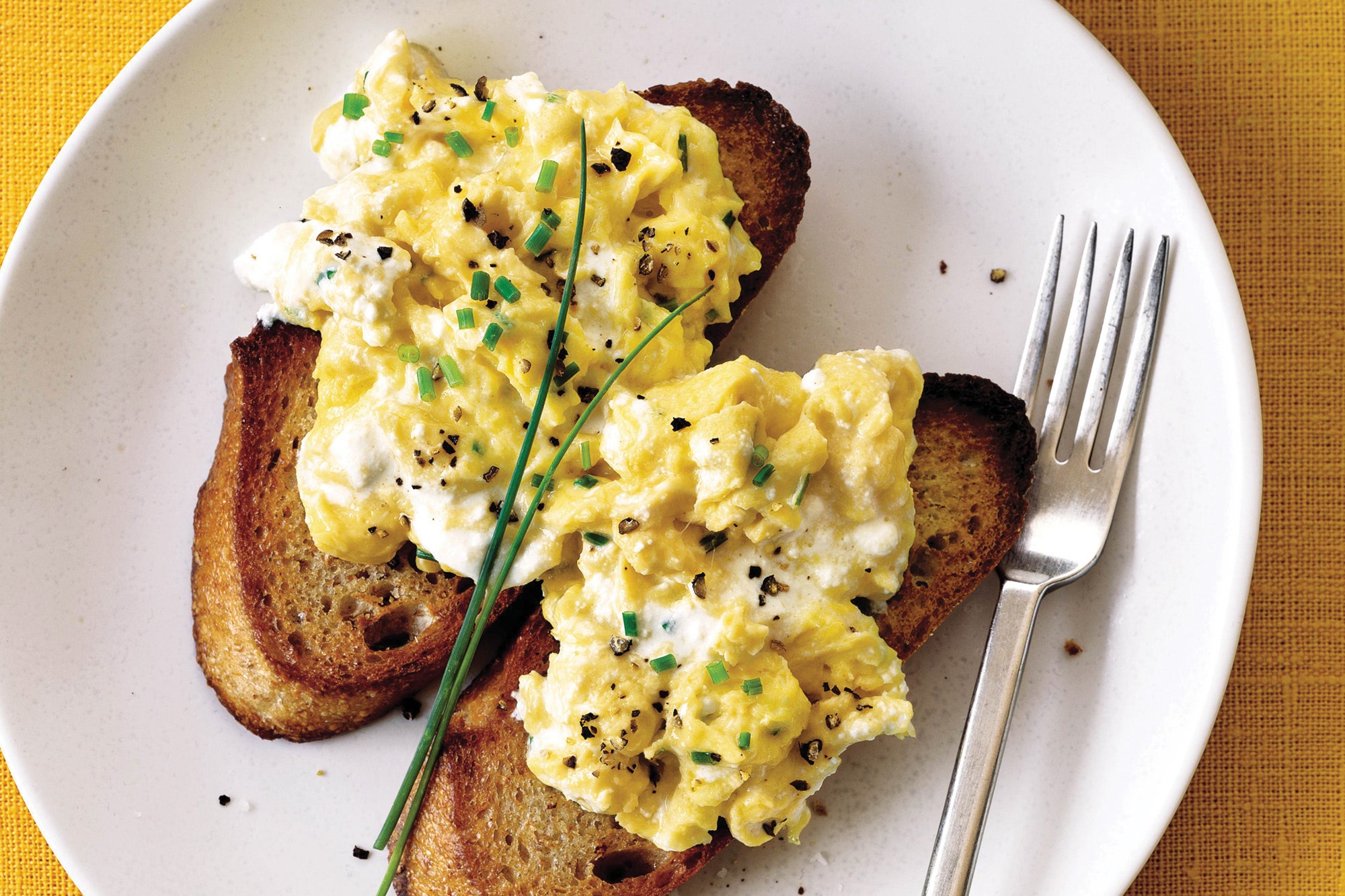 What does adding egg to ricotta do?