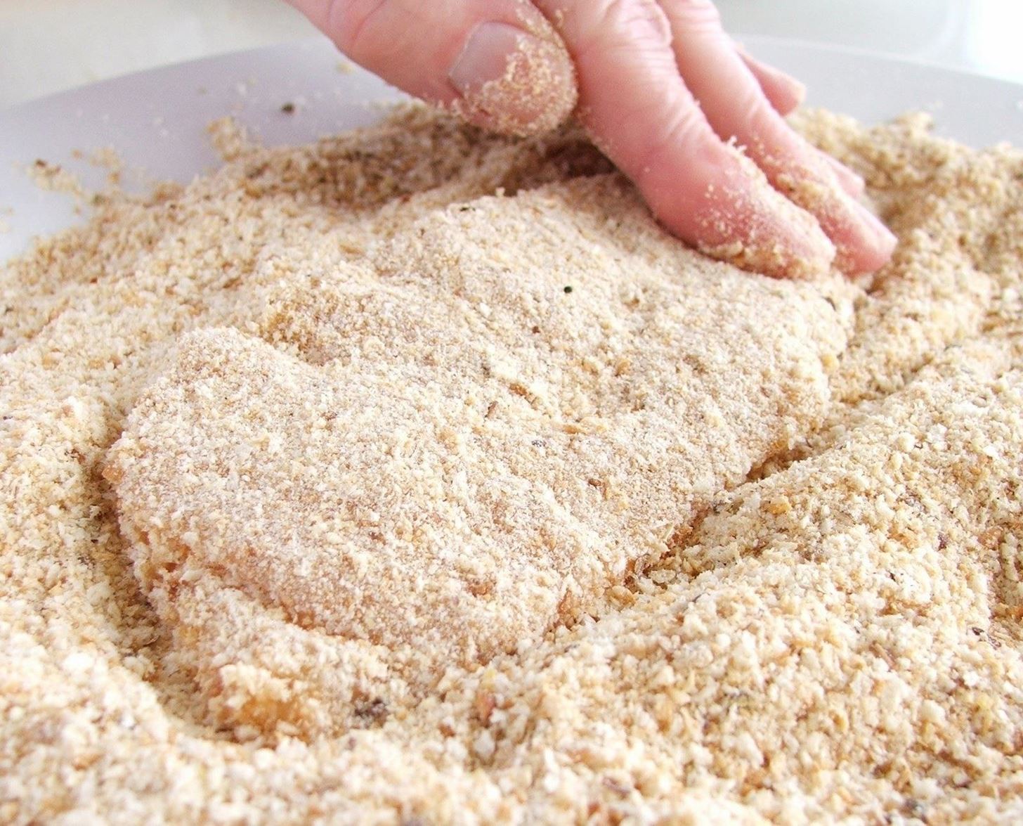 What does bread crumbs do to meat?