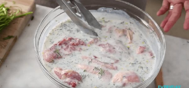 What does soaking meat in buttermilk do?