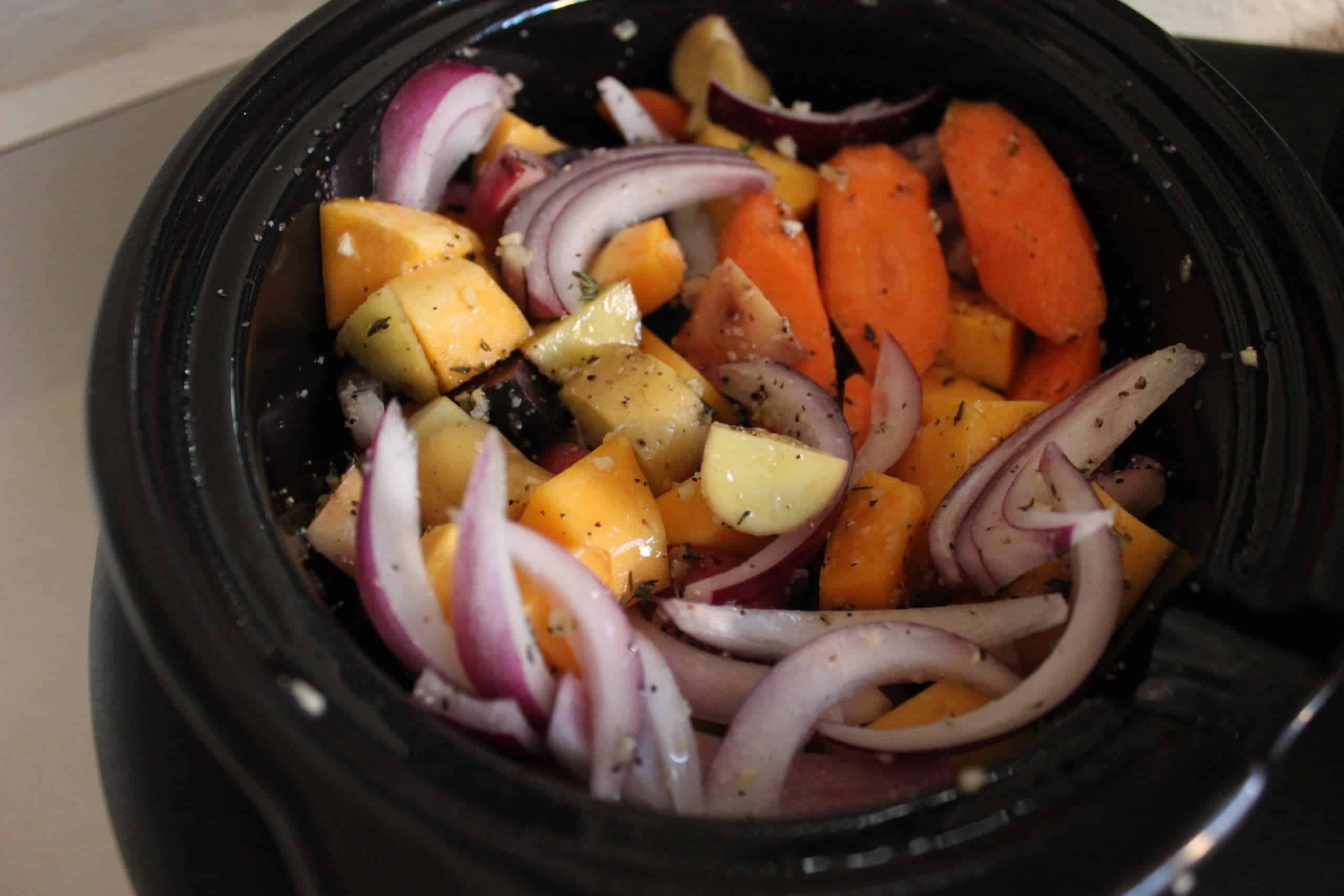 What goes in slow cooker first meat or vegetables?