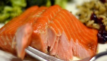 What happens if you accidentally eat raw salmon?