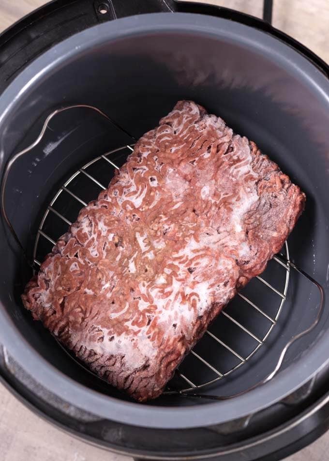 What happens if you cook slightly frozen ground beef?