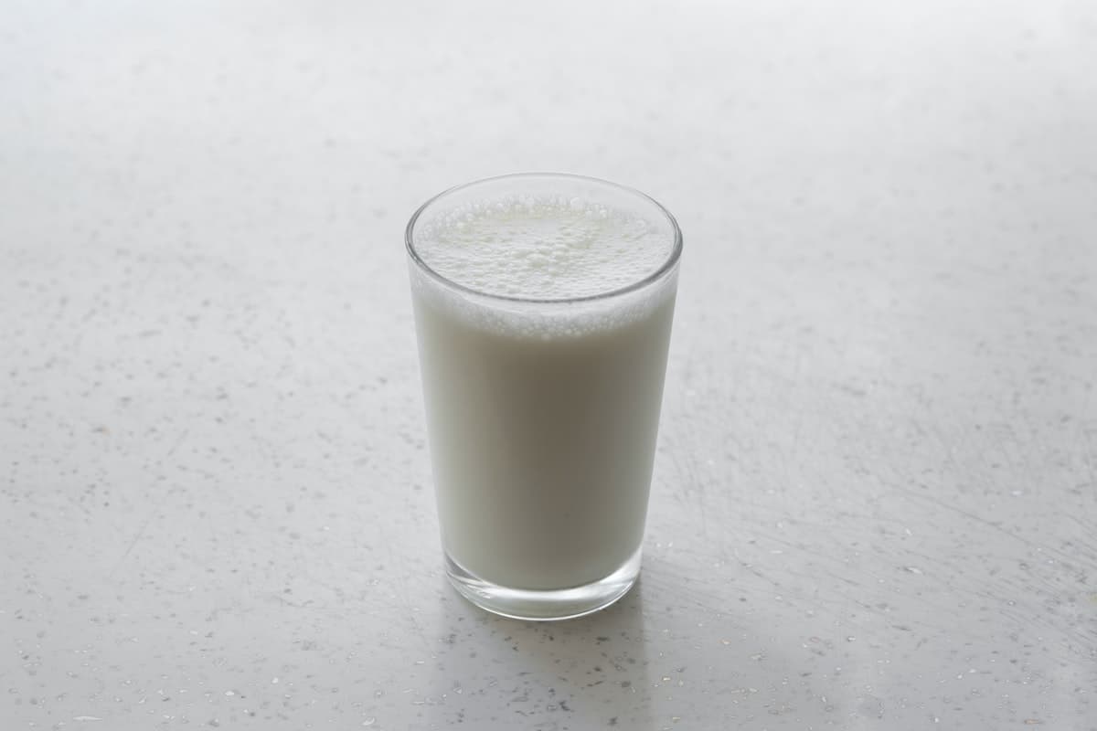 What happens if you drink milk that has been left out for a day?