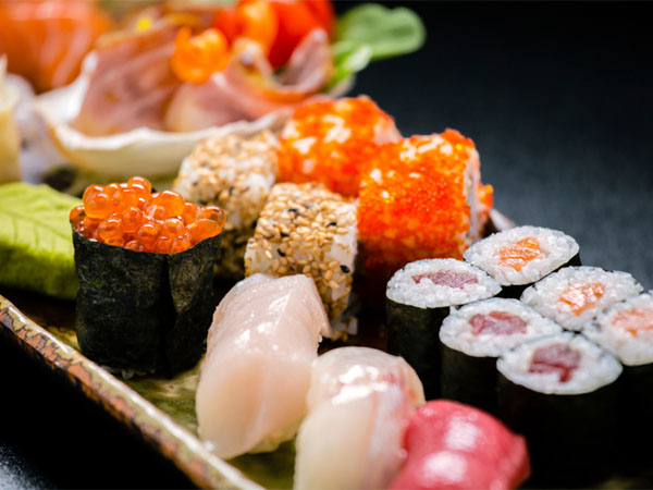 What happens if you eat raw seafood?