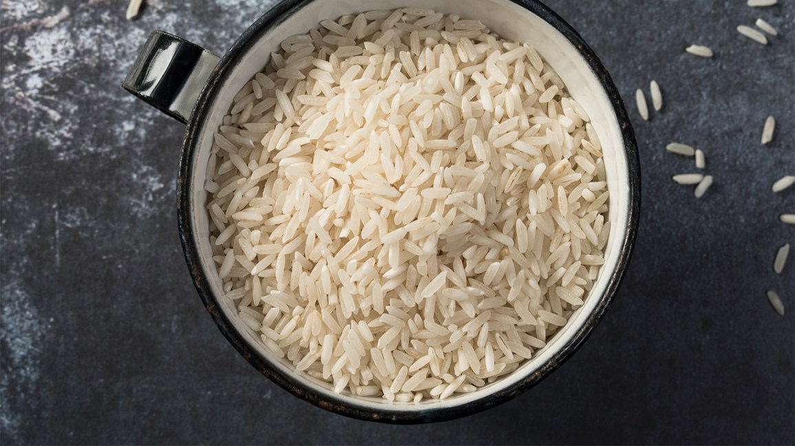 What happens if you eat uncooked cooked rice?