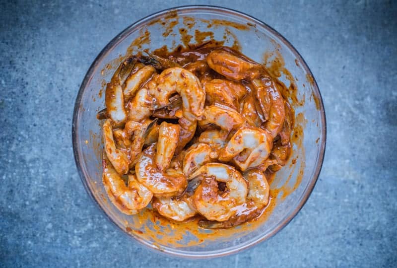 What happens if you marinate shrimp too long?