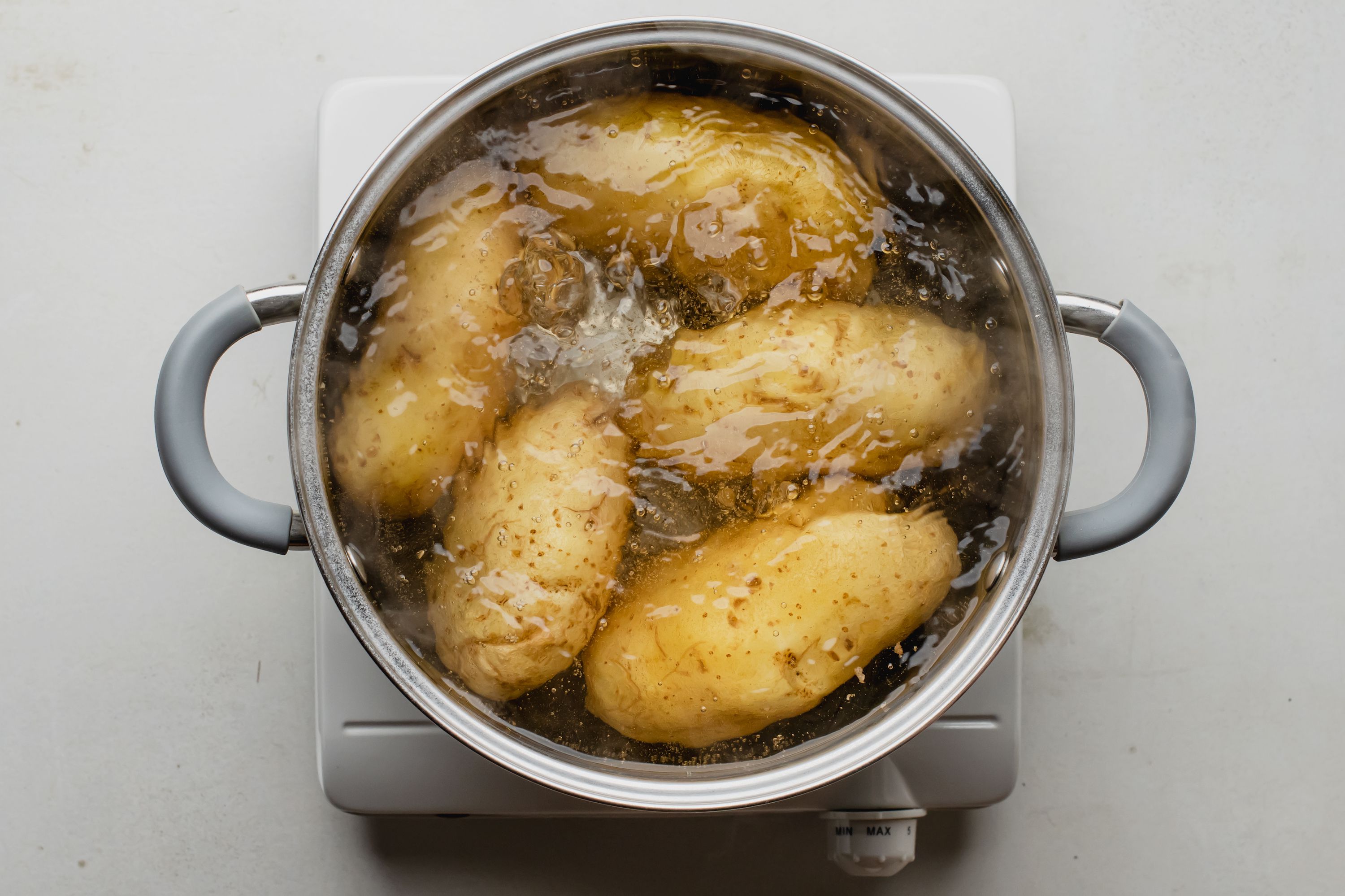 What happens to a potato in boiling water?