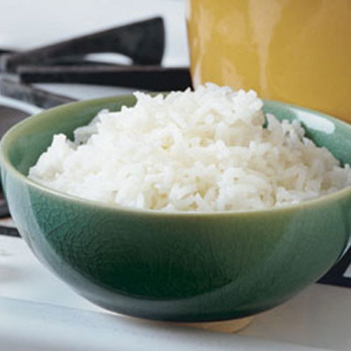 What happens to rice when it is cooked in a liquid?