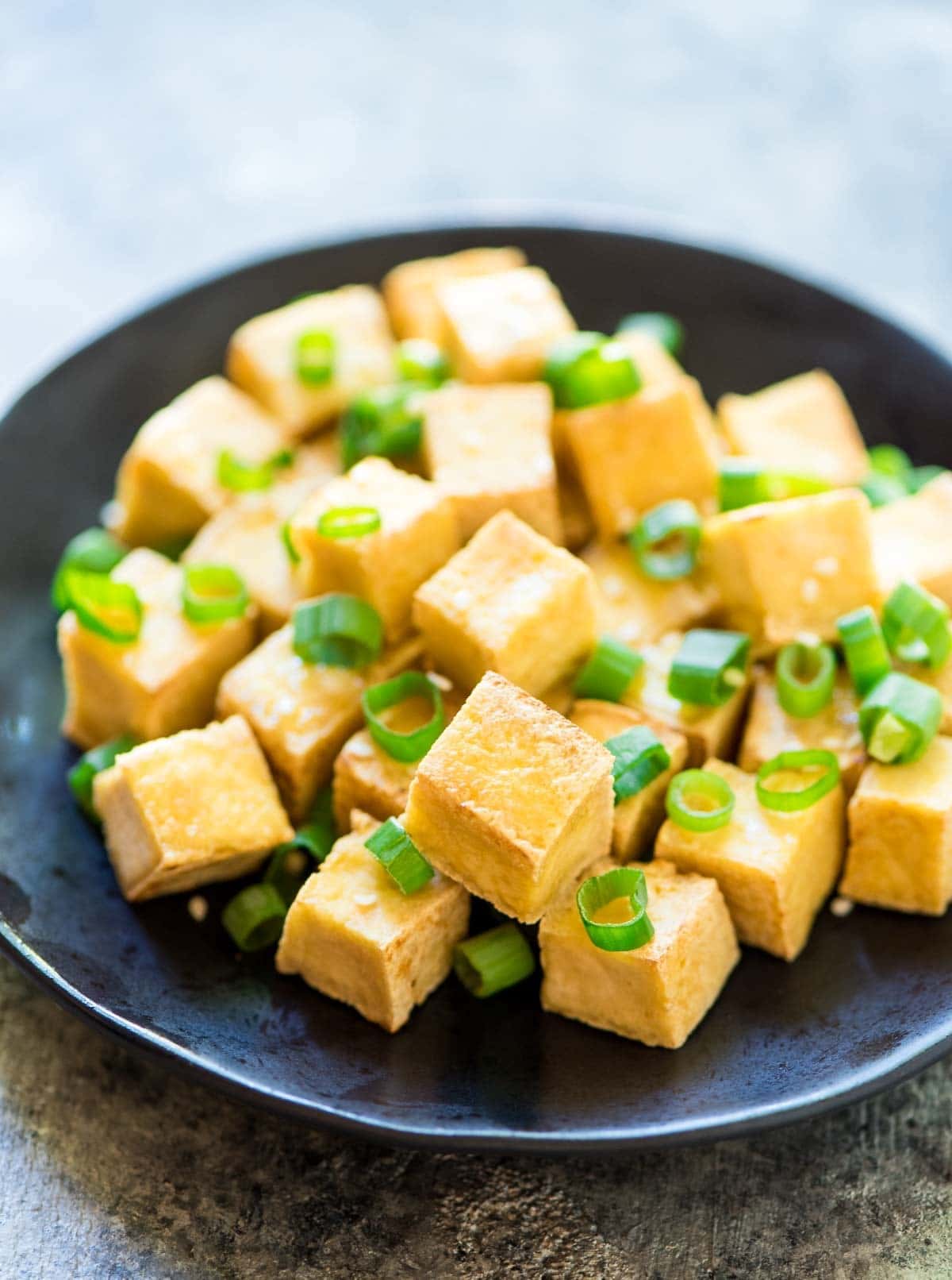 What happens to tofu when it's cooked?